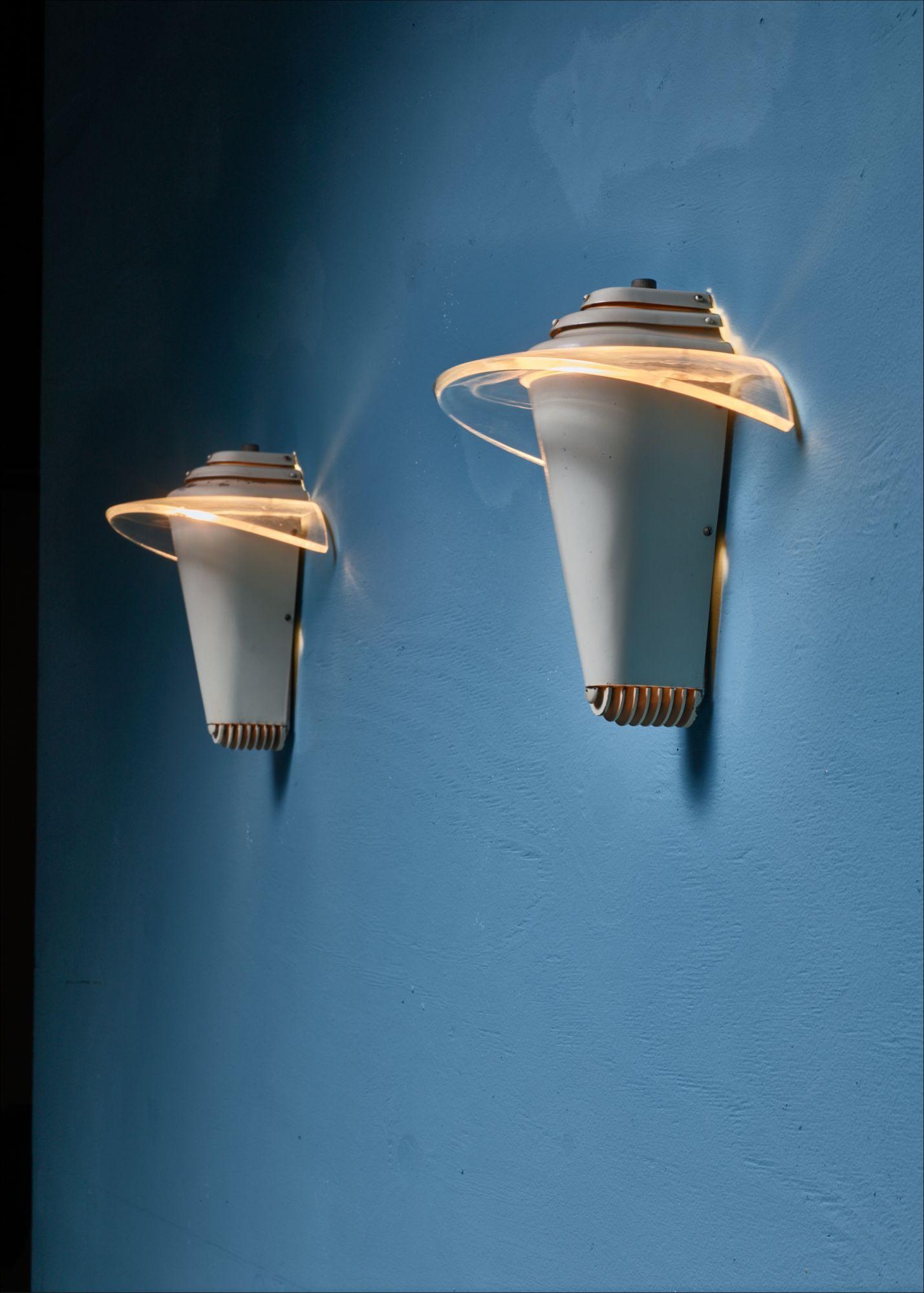 Pair of Eralite MFG metal and plexiglass wall lamps, England, 1940s