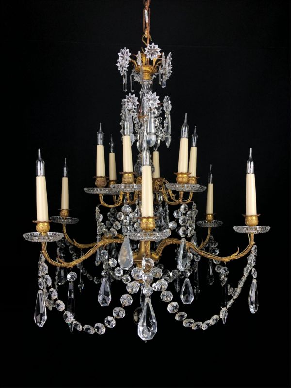 A gilt brass and cut glass Louis XVI style chandelier