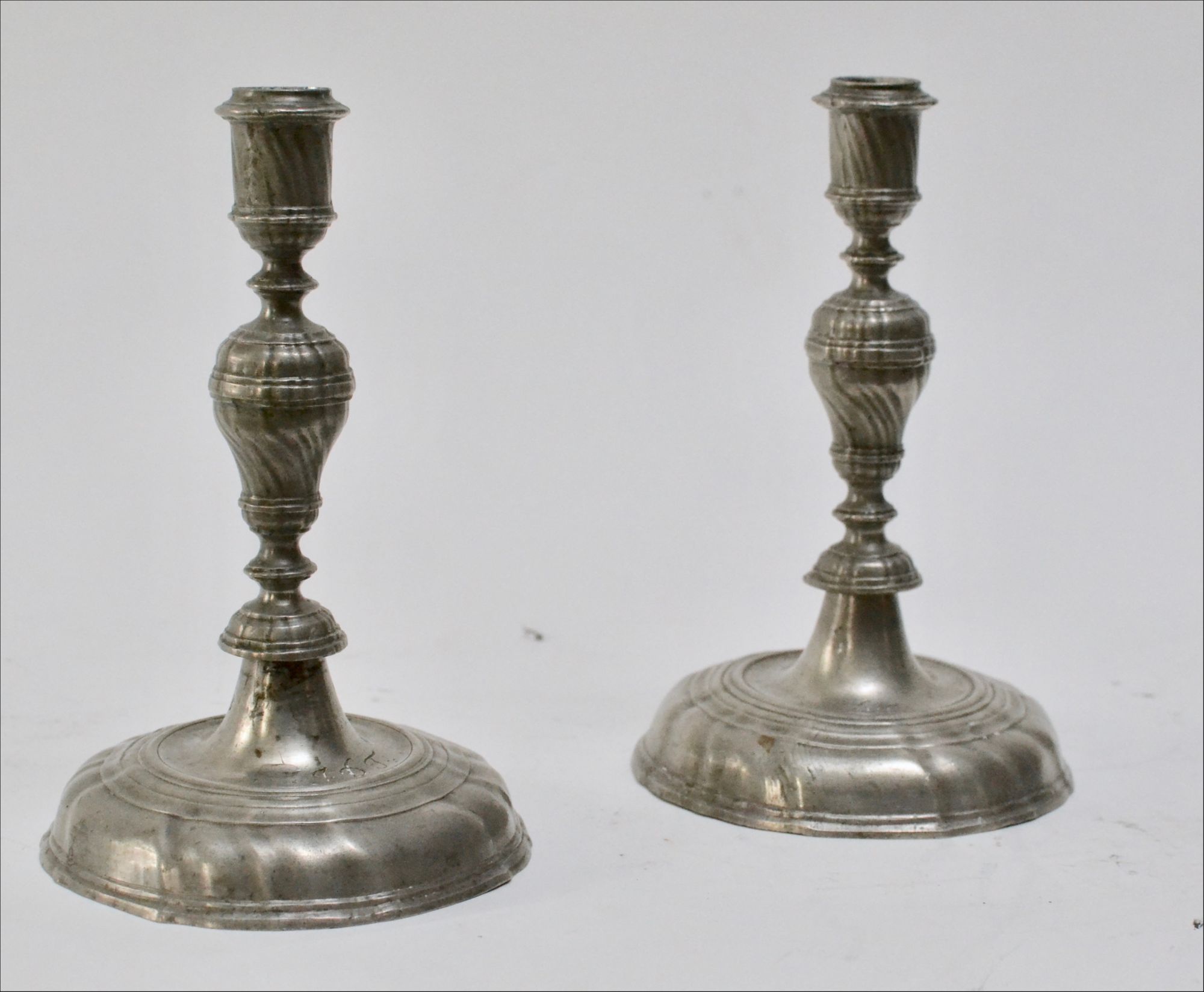 A Pair Of Baroque Pewter Candlesticks, 18th Century